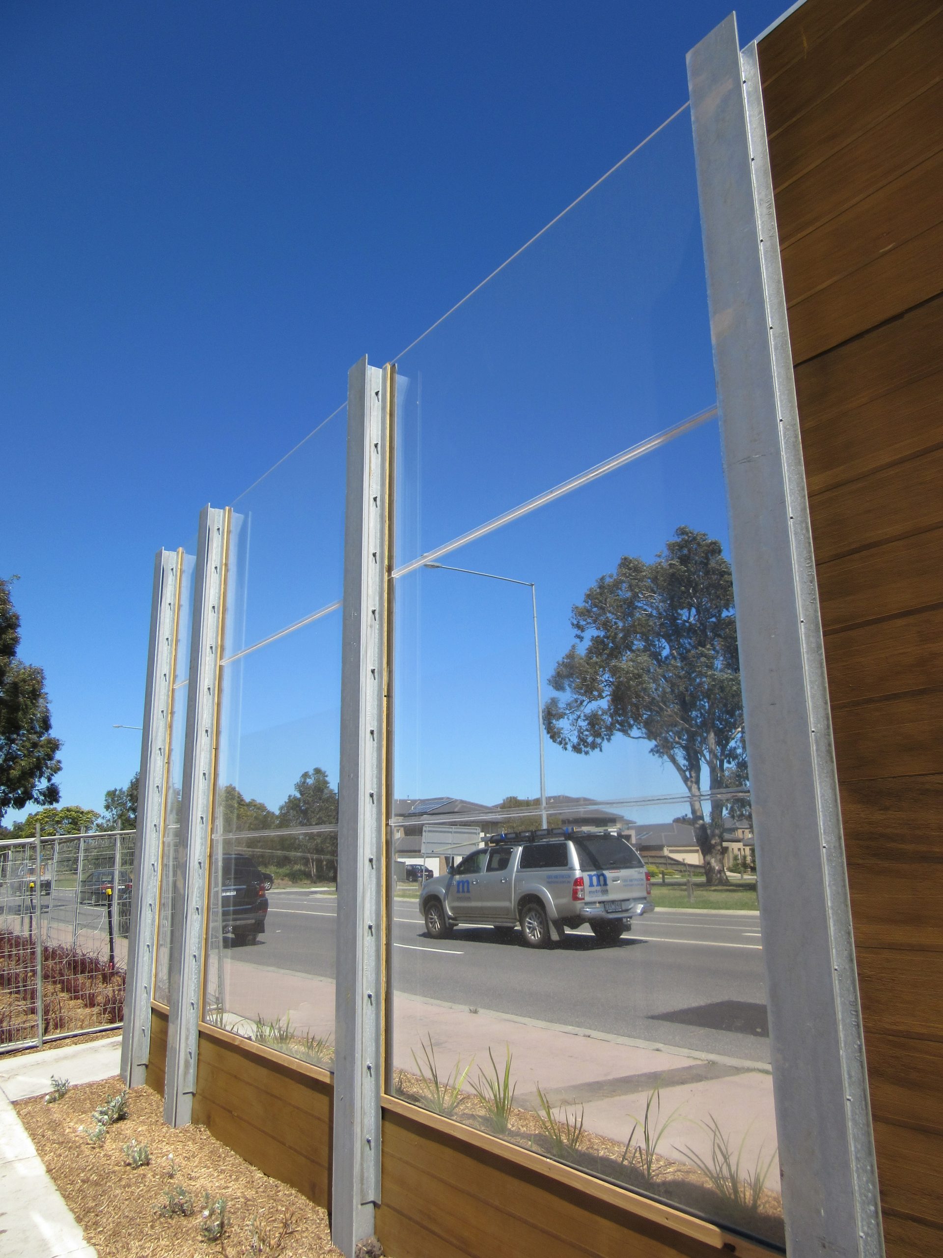Acoustic Fencing - Perspex & Timber VicRoads Noise Wall | Lee Group